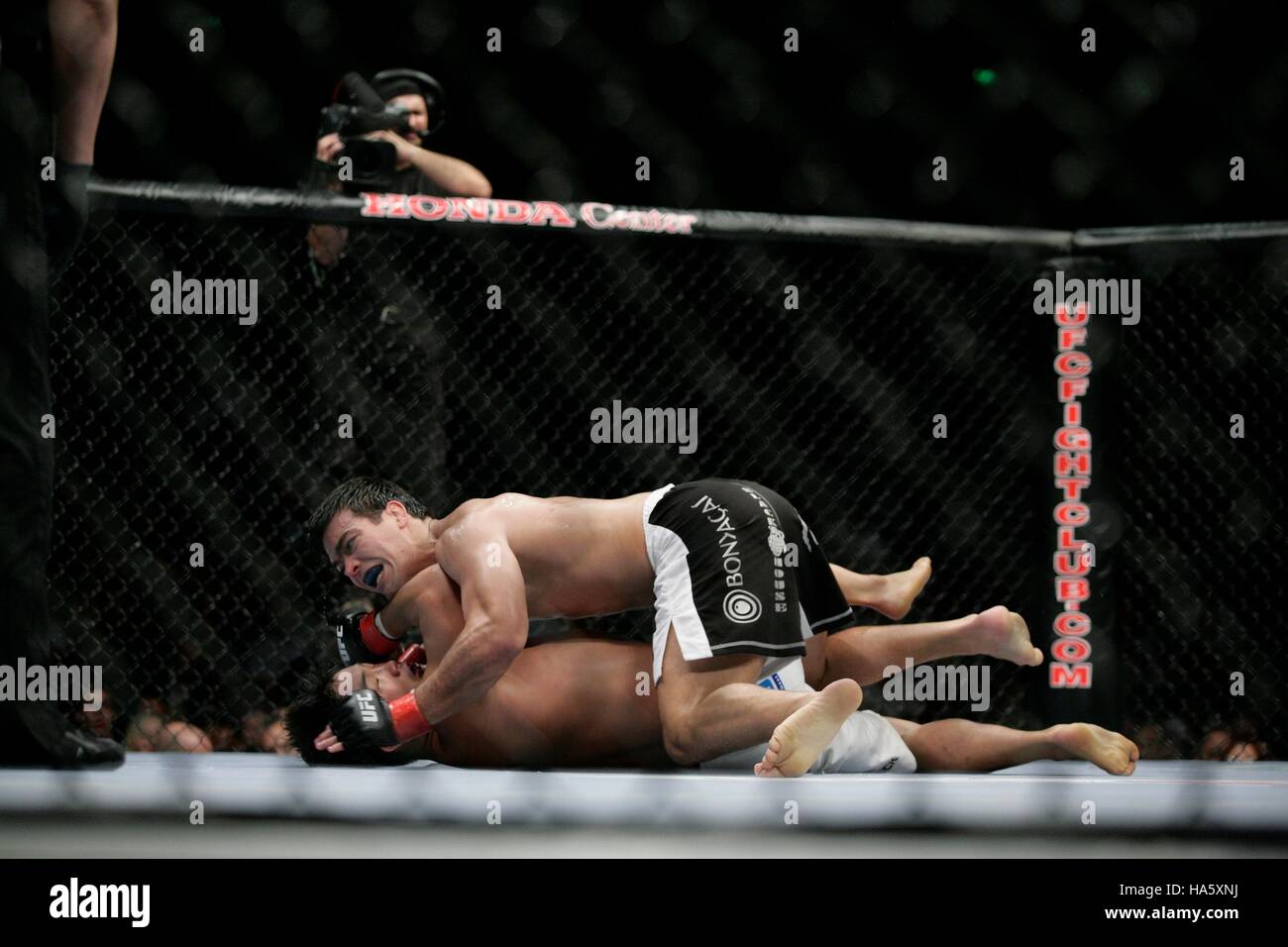 Lyoto Machida, top, fights Kazuhiro Nakamura at UFC 76 during a mixed ...