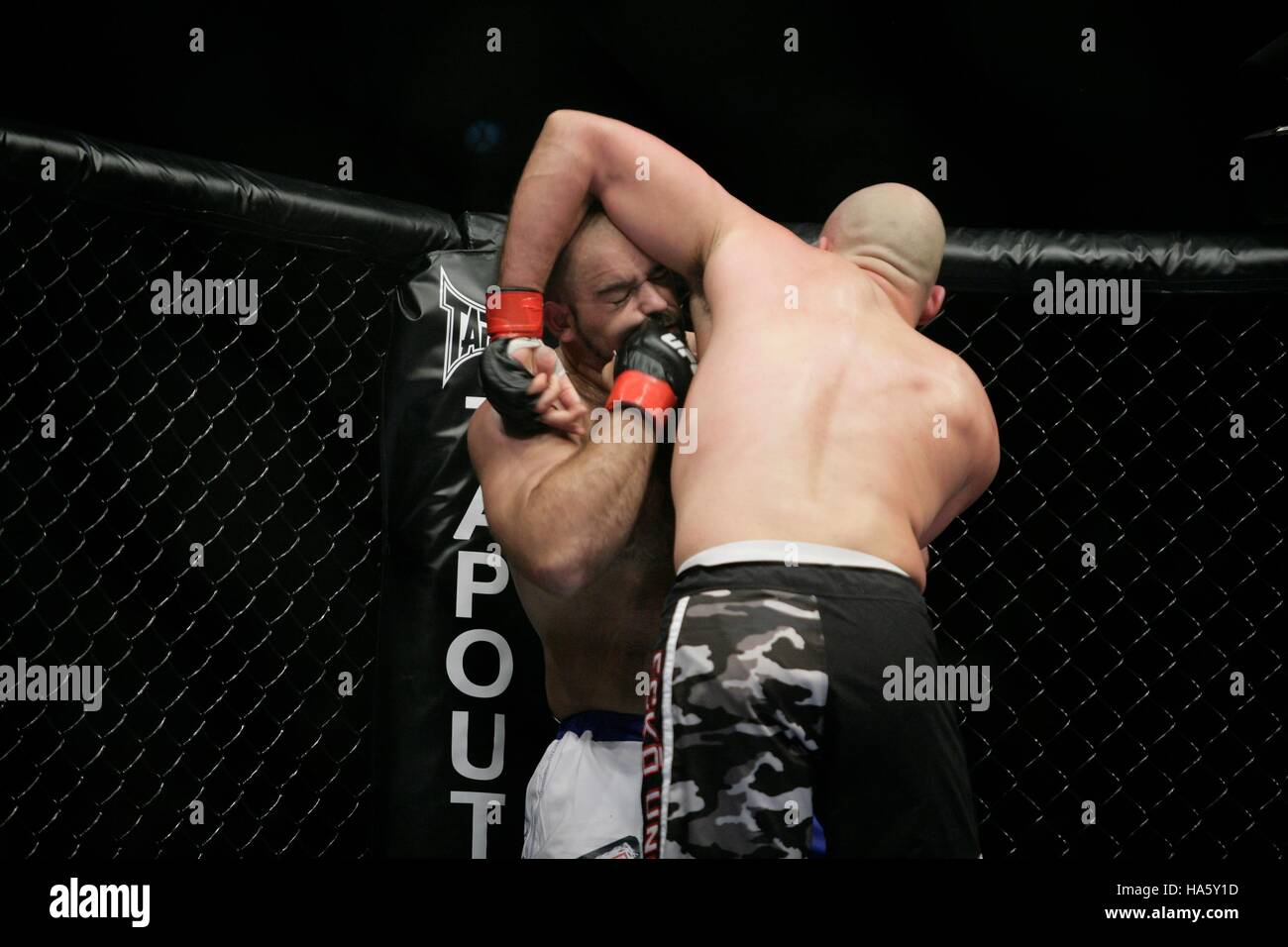 Scott Junk, left, fights Christian Wellisch at UFC 76 during a mixed ...