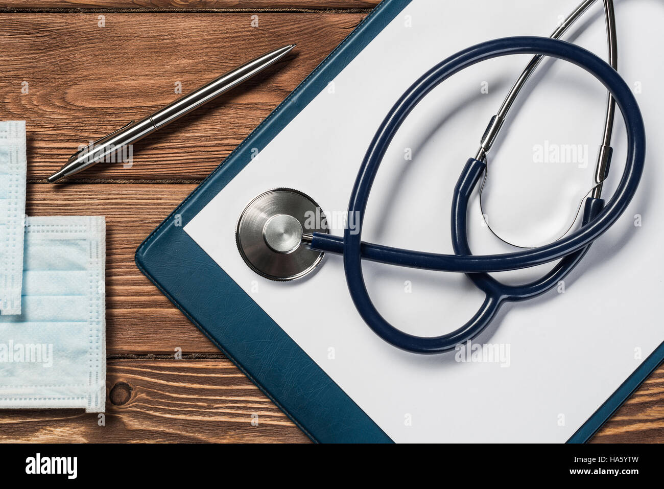 Desk of doctor with medicine things Stock Photo - Alamy