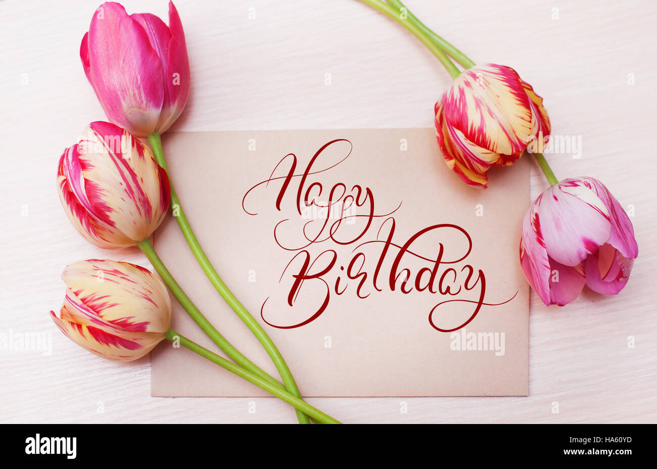 Bouquet of red tulips on white background with text Happy Birthday ...
