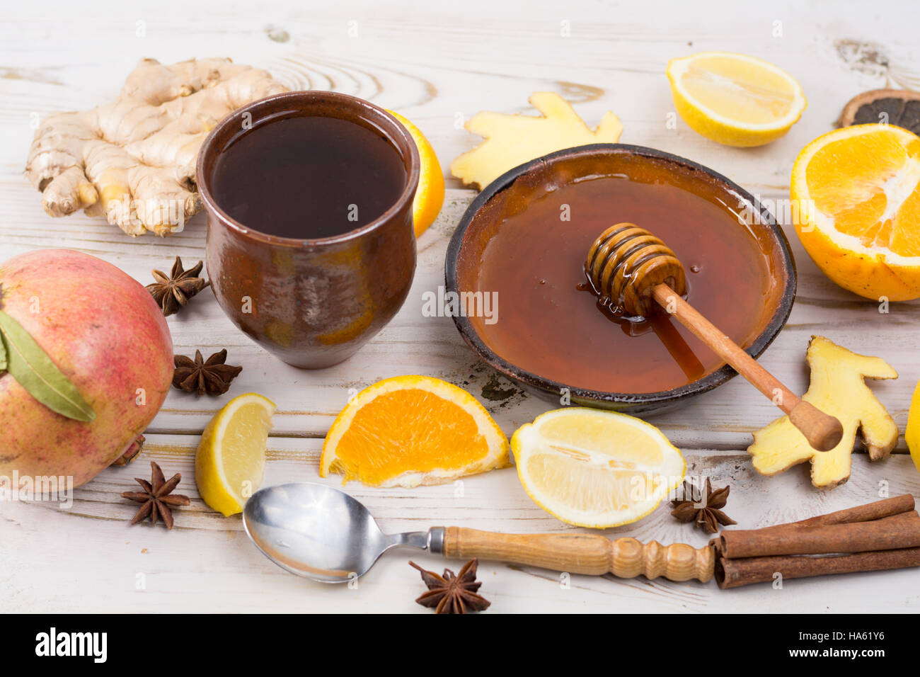 Natural flu and cold remedy - orange and lemon fruit, fresh ginger ...