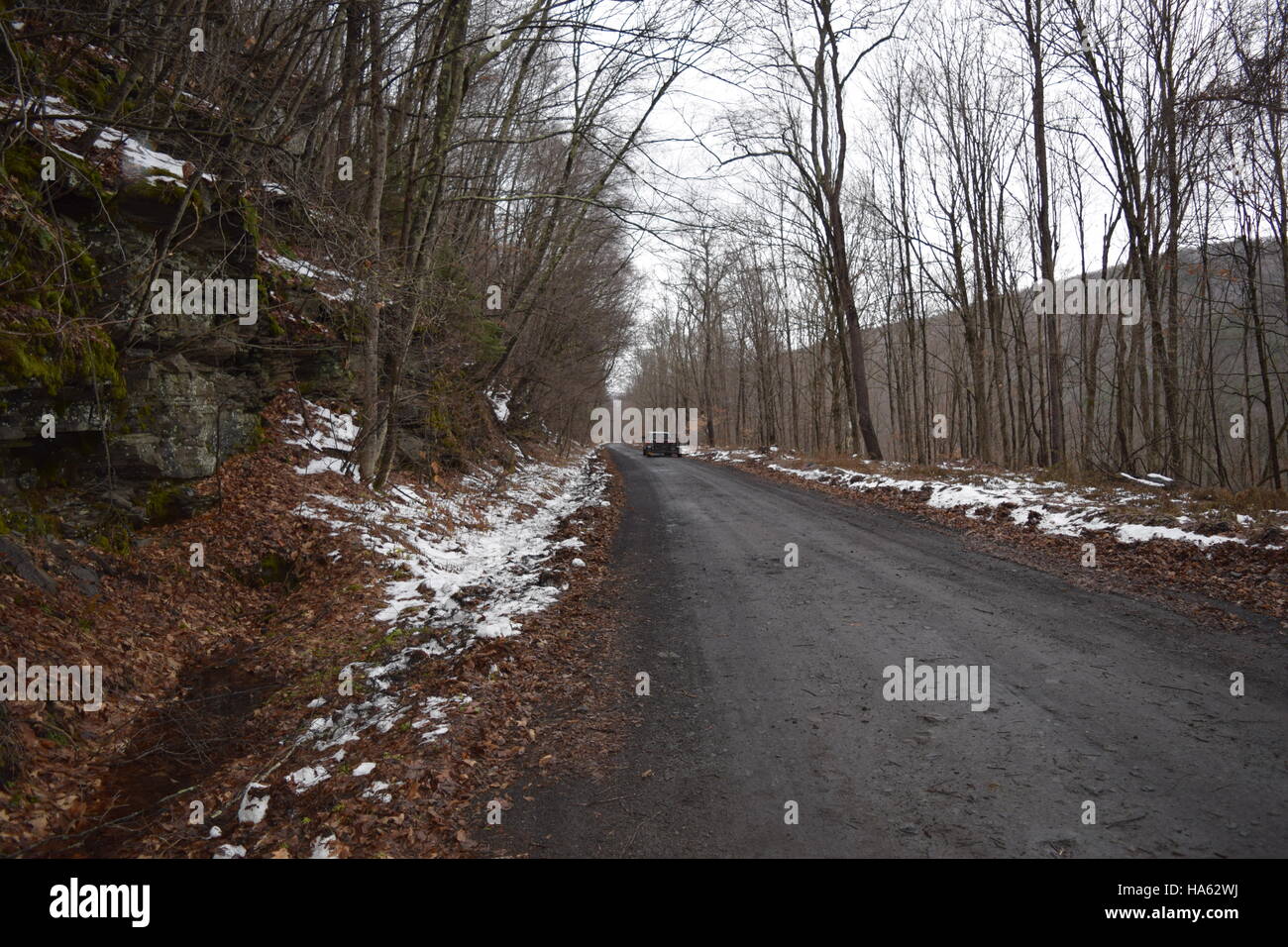 Dirt Road with a Car in the Distance Stock Photo - Alamy
