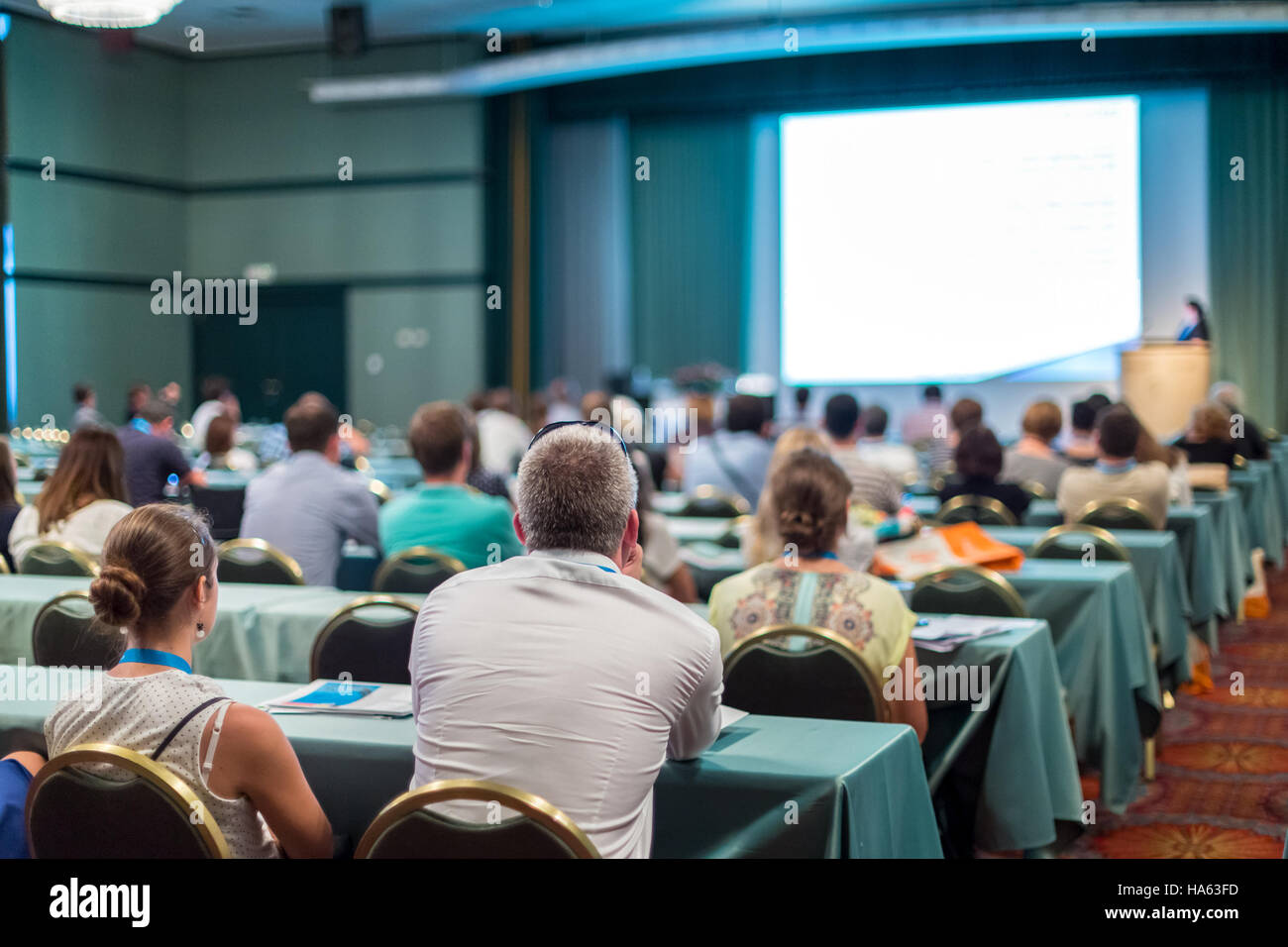 Audience in lecture hall participating at scientific conference Stock ...