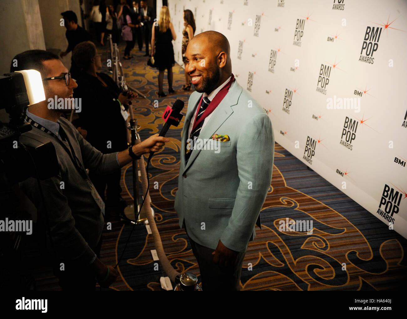 Singer/songwriter Claude Kelly attends the 2013 BMI Pop Music Awards at ...