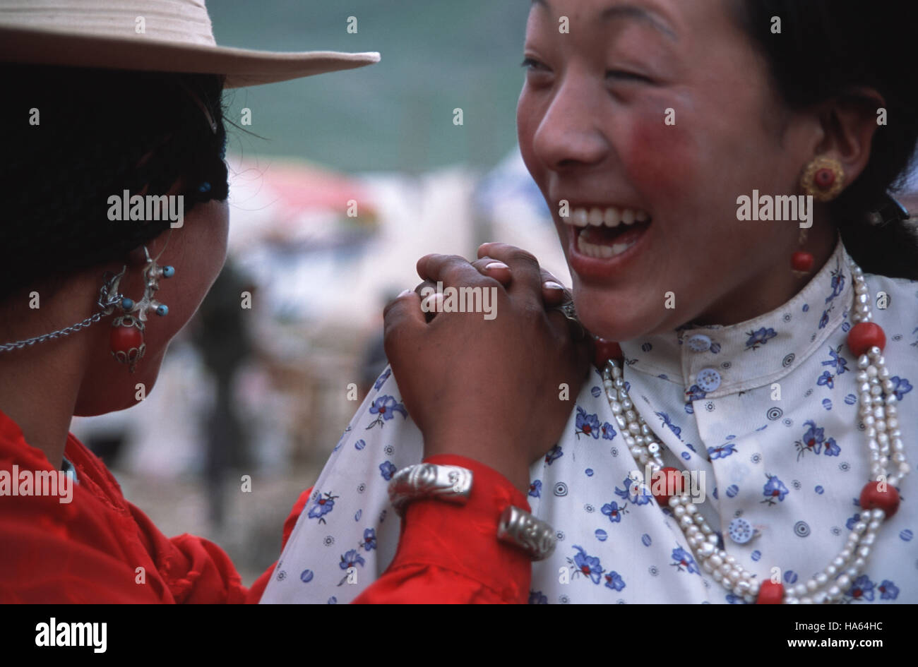 Caption: Yushu, Quinghai, China - Aug 2002. Khampa women at the annual ...