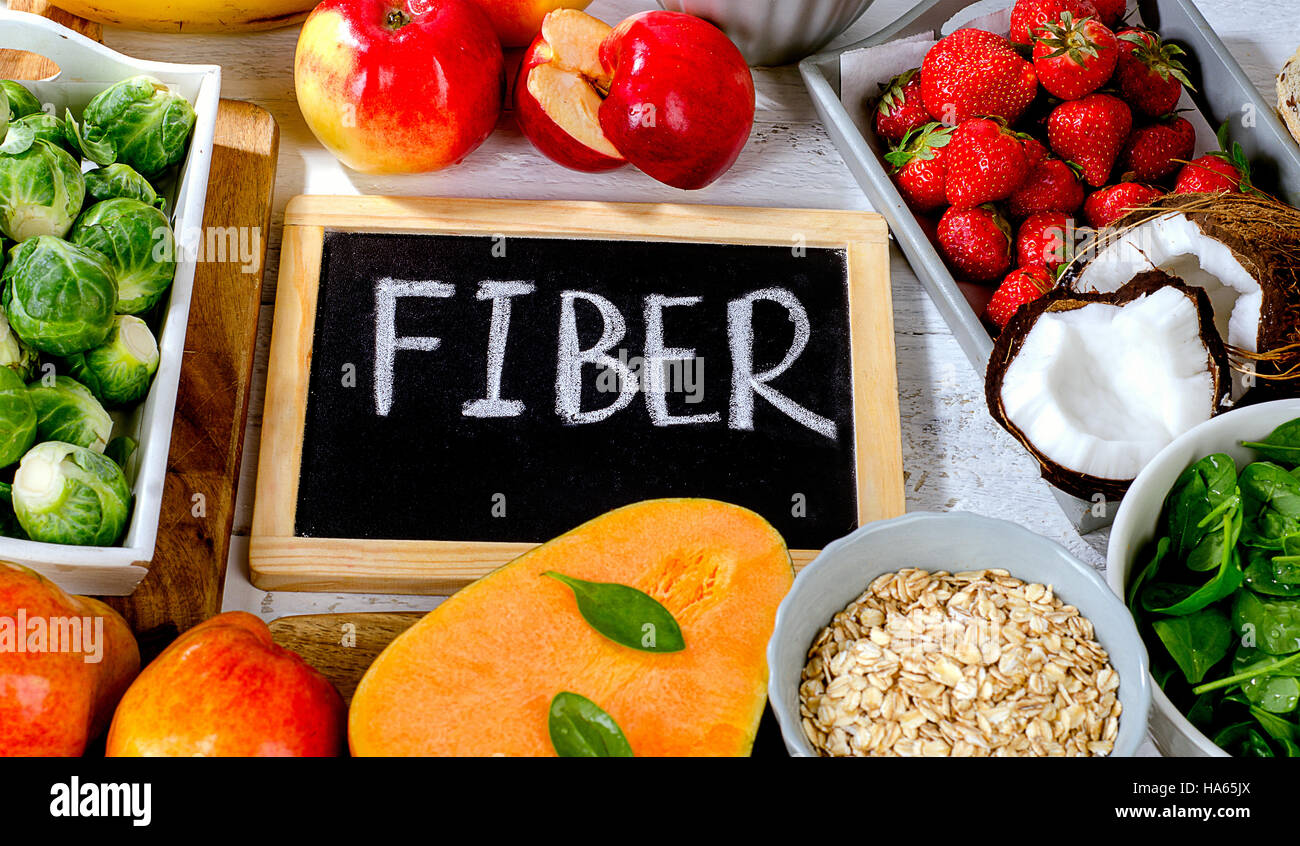High Fiber Foods on a white wooden background. Top view Stock Photo - Alamy