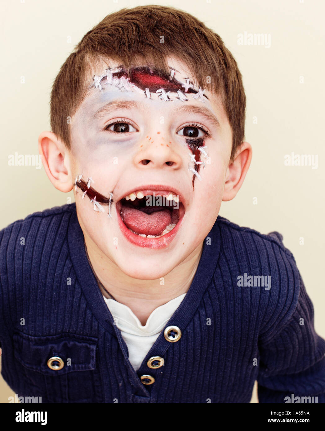 little cute boy with facepaint like zombie apocalypse at hallowe Stock ...