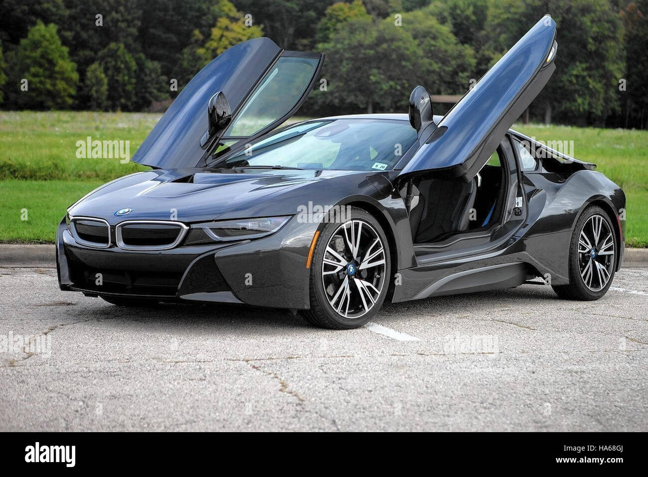 The BMW i8, a plug-in hybrid vehicle, represents the Department of ...