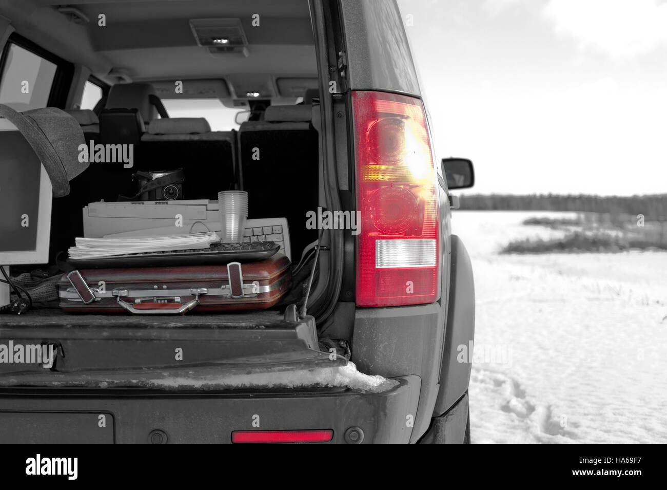 Various personal effects placed in a car trunk, concept of business ...