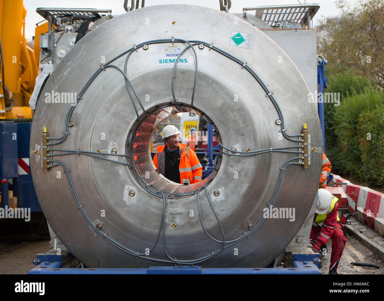 Workers ready an ultra-powerful Â£10 million magnetic resonance imaging ...