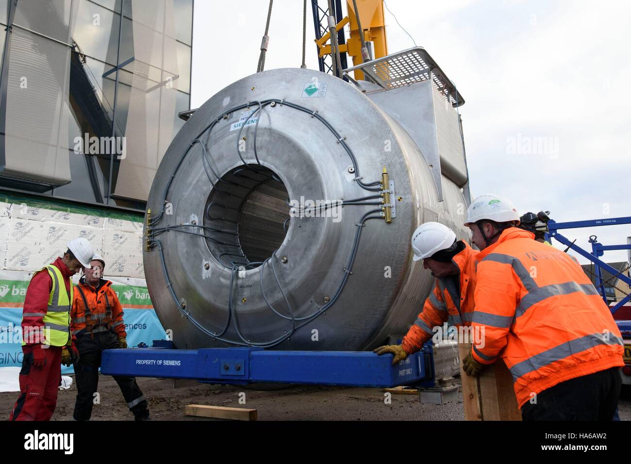 Workers prepare an ultra-powerful Â£10 million magnetic resonance ...