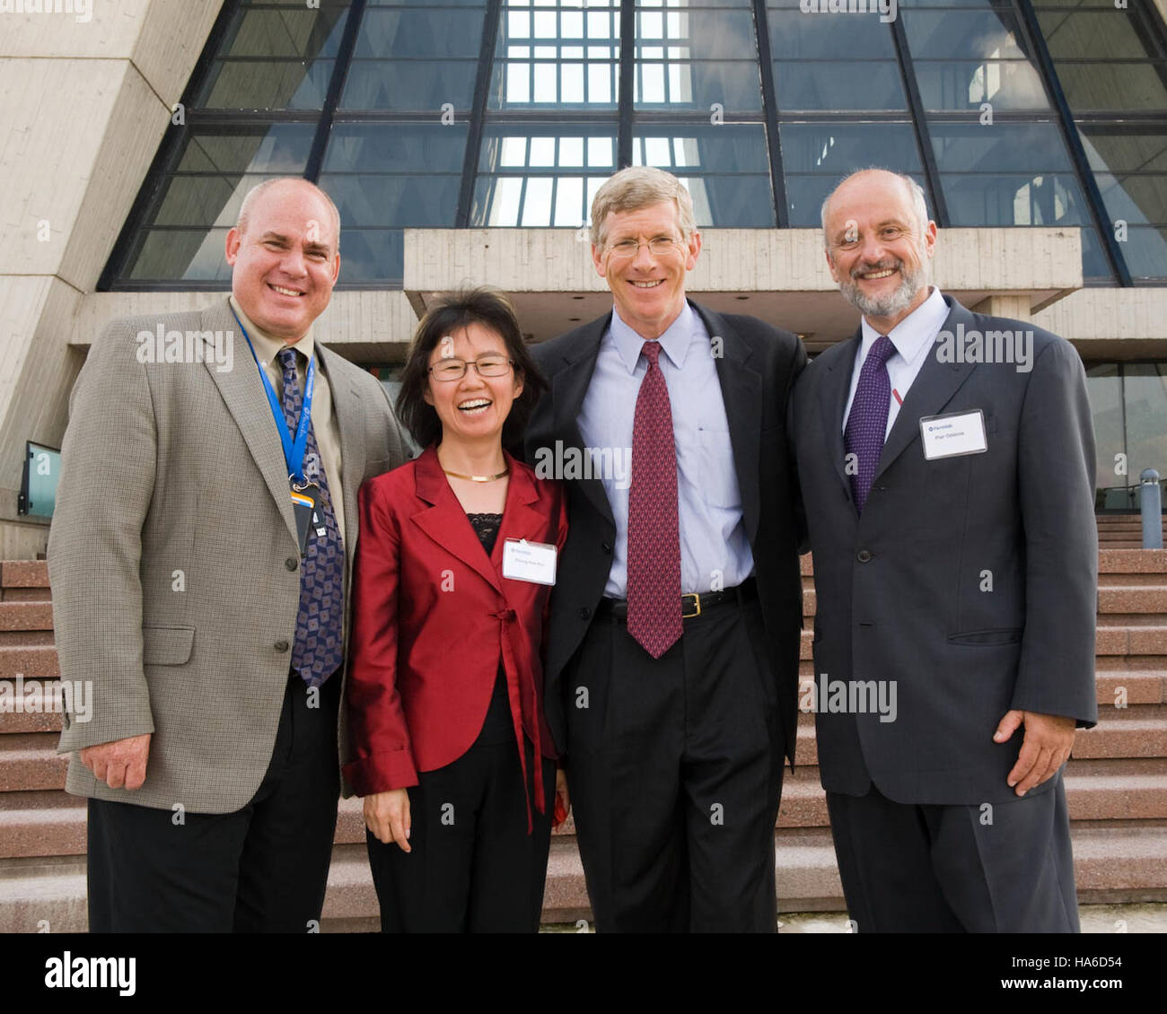 A group photo at Fermilab, showcasing key figures from the Department ...