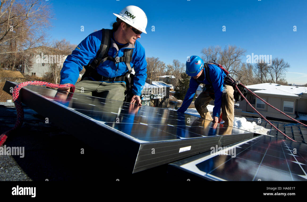 A photovoltaic (PV) system is installed on a townhome, demonstrating ...