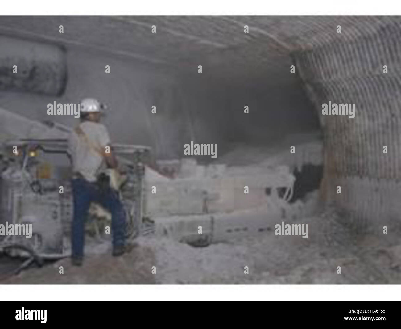 This image shows a worker at the Waste Isolation Pilot Plant (WIPP), a ...