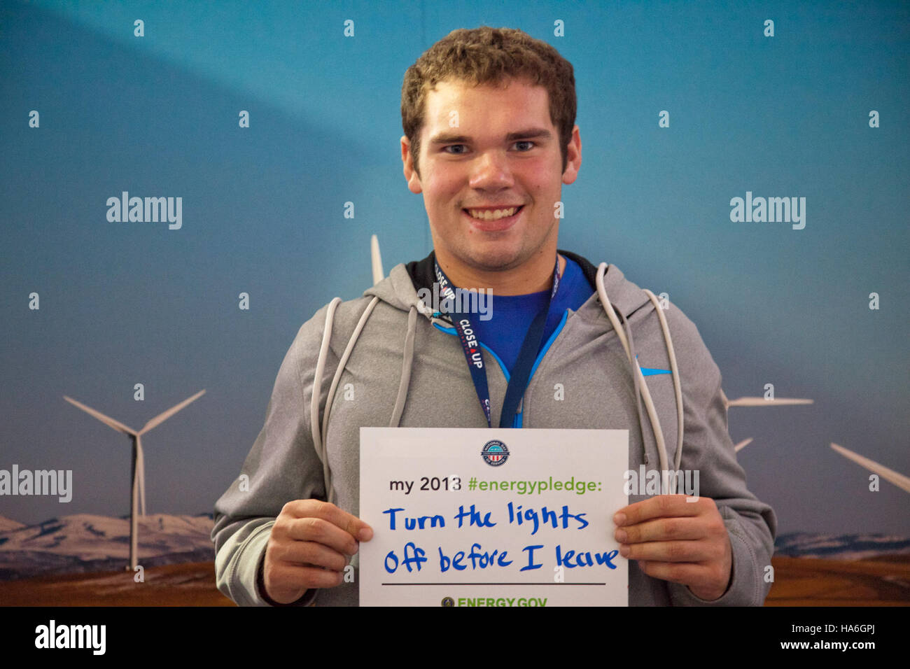 This image promotes the concept of an energy pledge, focusing on ...