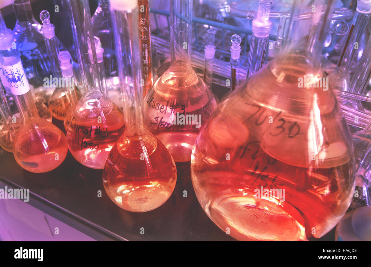 Scientific equipment such as volumetric flasks and laboratory beakers ...