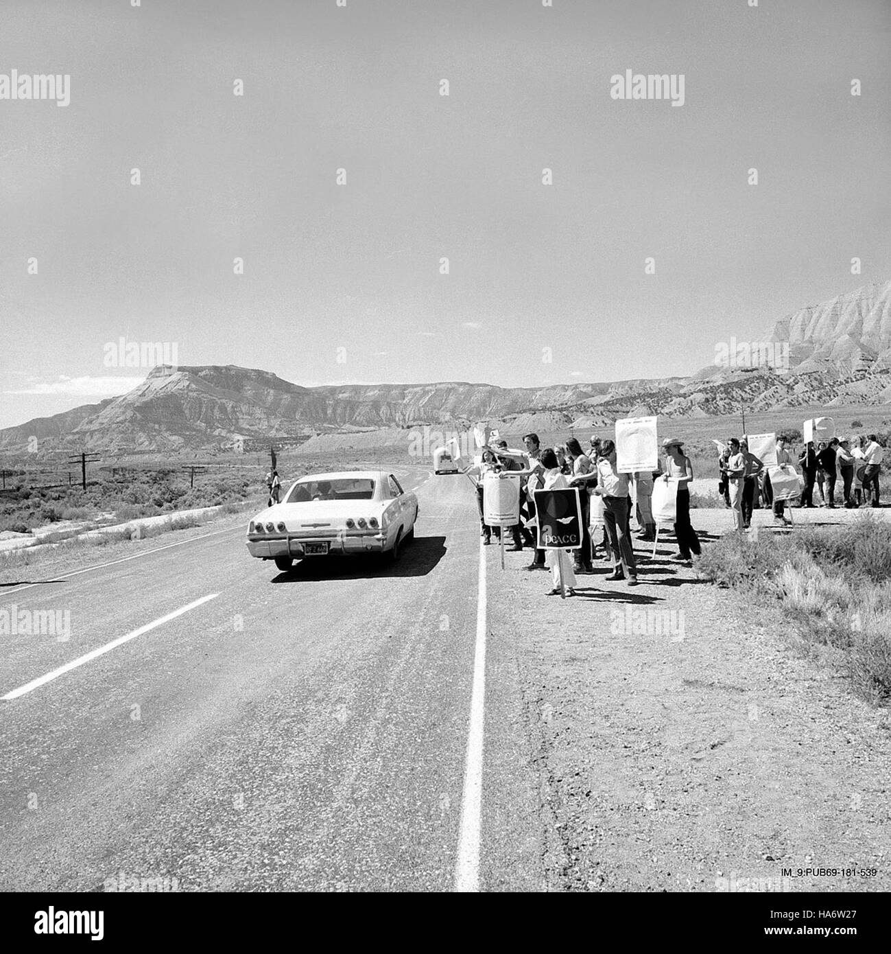 This image shows protesters at the Rulison shot site, distributing ...