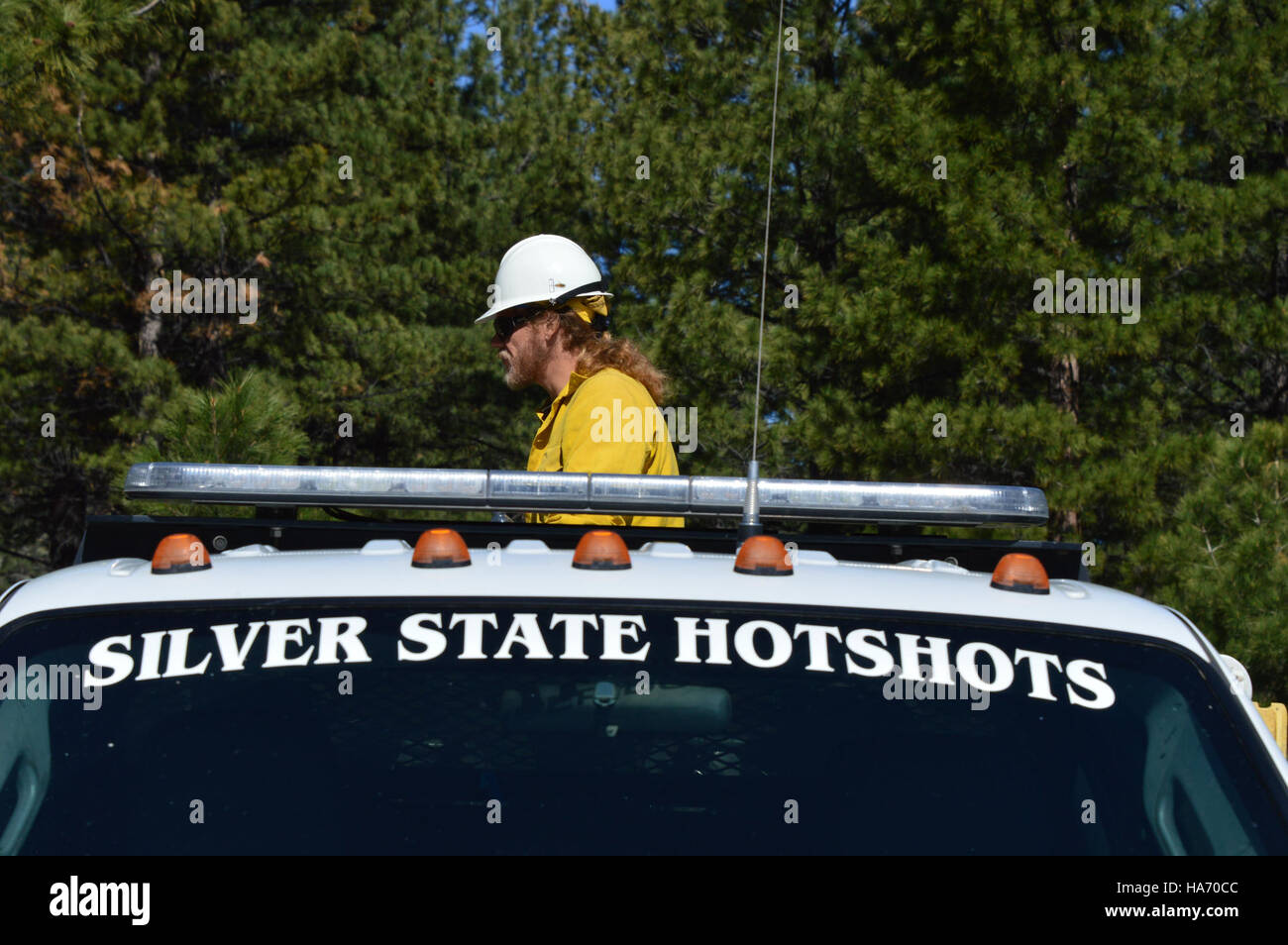 This image shows the Silver State Interagency Hotshot Crew at work ...