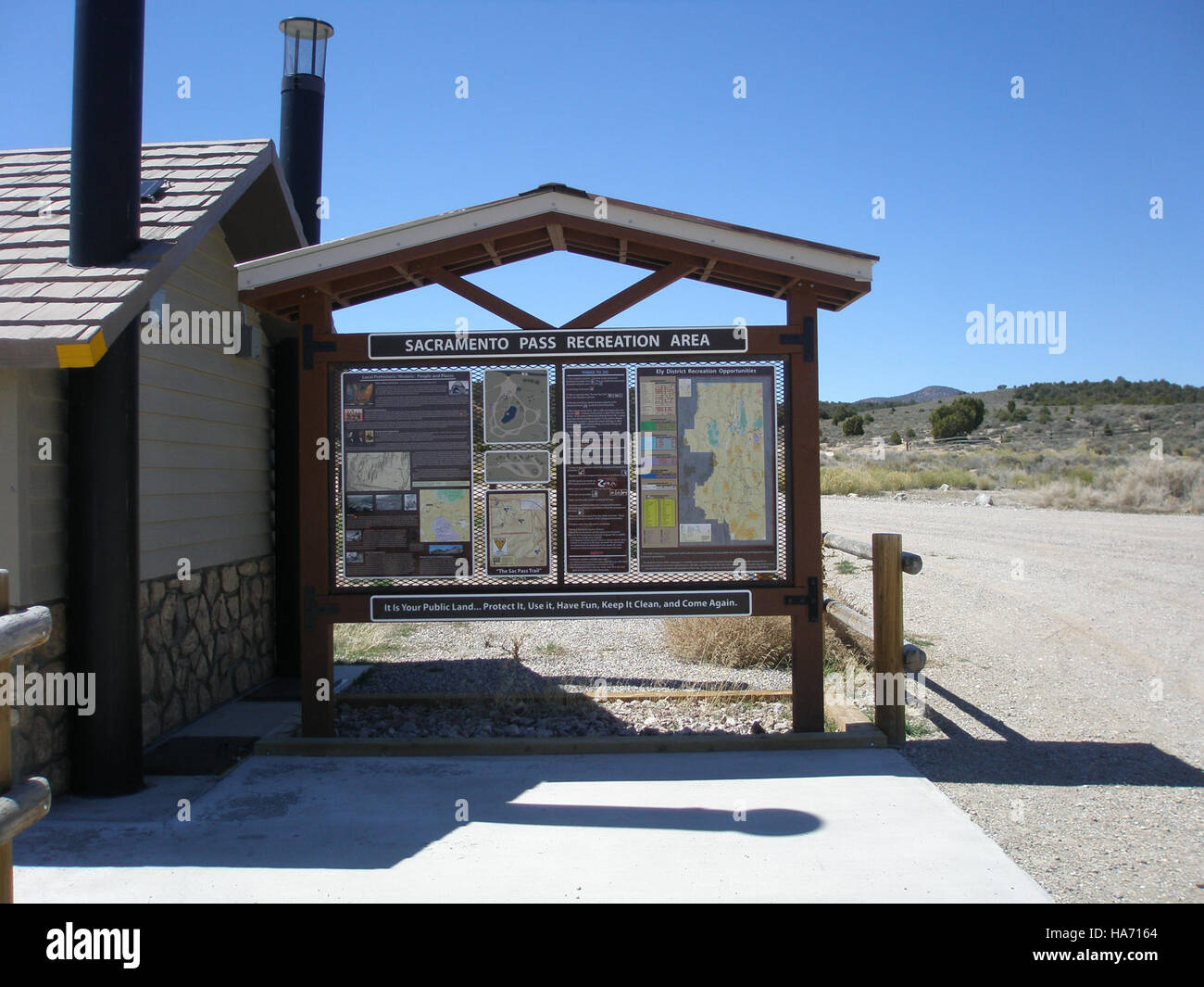 This image shows a new kiosk and maps installed at a national park ...
