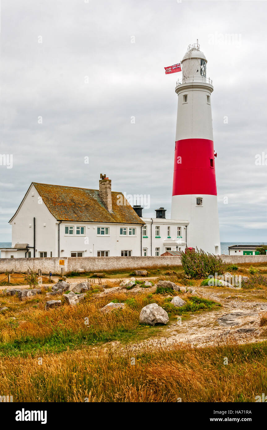 The tall red and white working lighthouse sits proudly at the southern ...