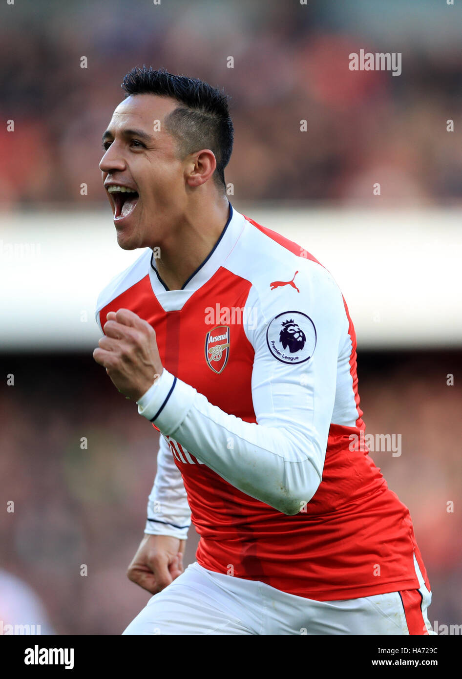 Arsenal's Alexis Sanchez celebrates scoring his side's first goal of ...