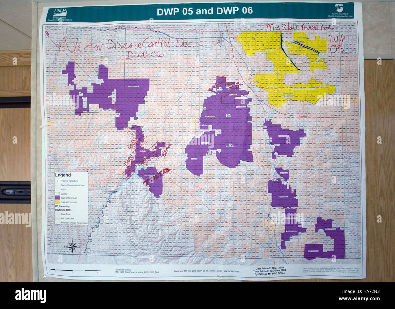The USDA employees are pictured conducting invasive species management ...