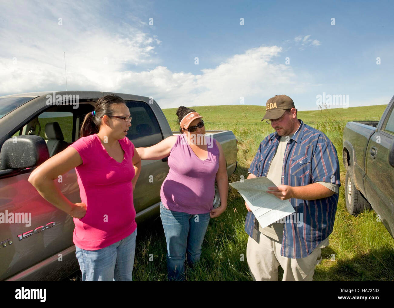 This image depicts USDA employees working to establish treatment blocks ...