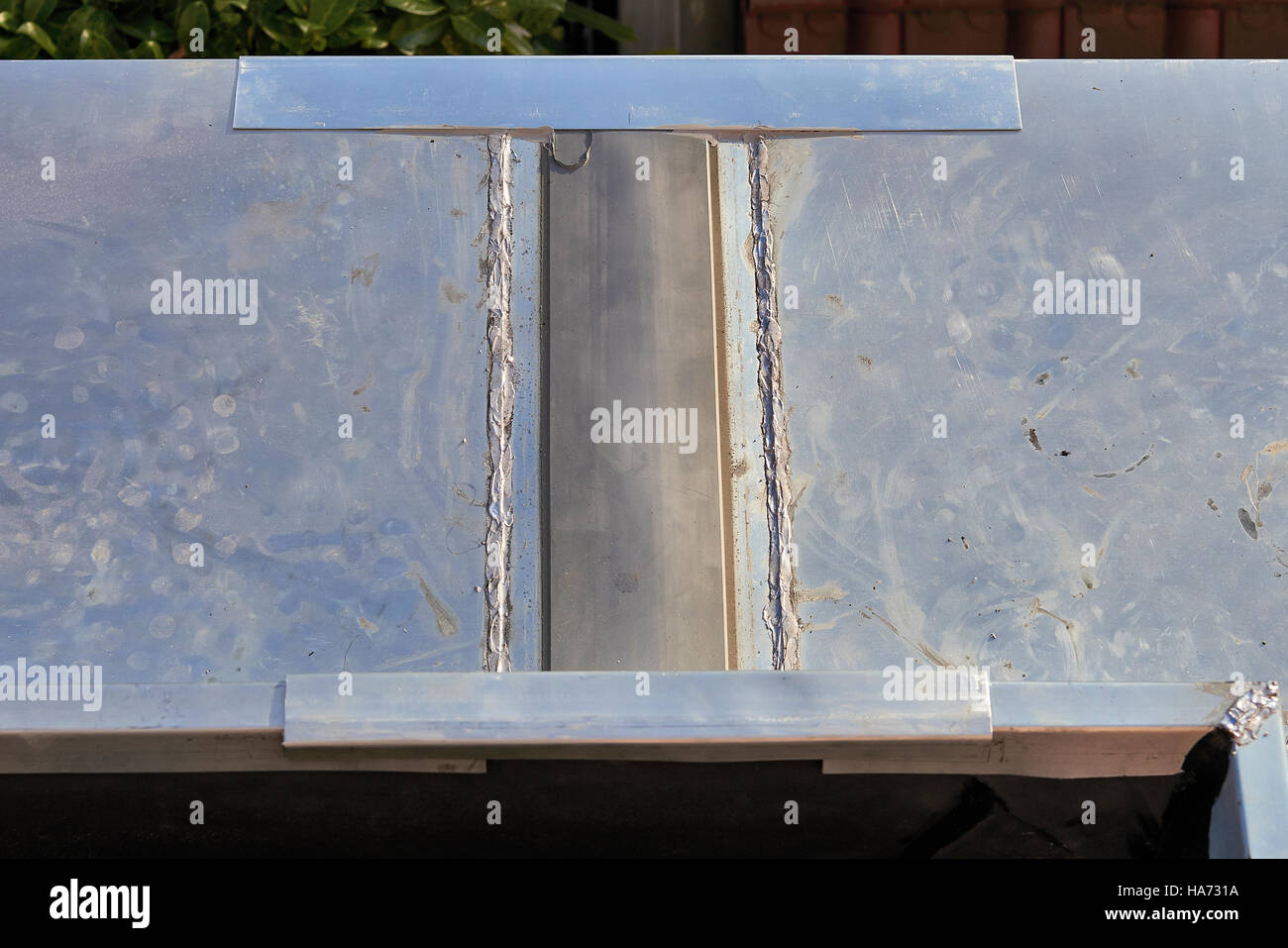 New zinc for roof in construction Ready for completion Stock Photo - Alamy