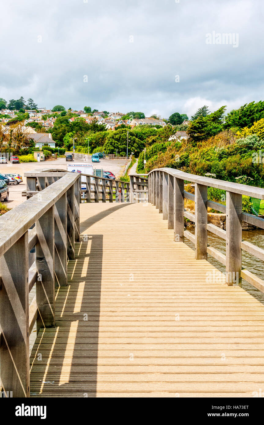 A wooden bridge crosses the River Char from the car park in Sea Lane to ...