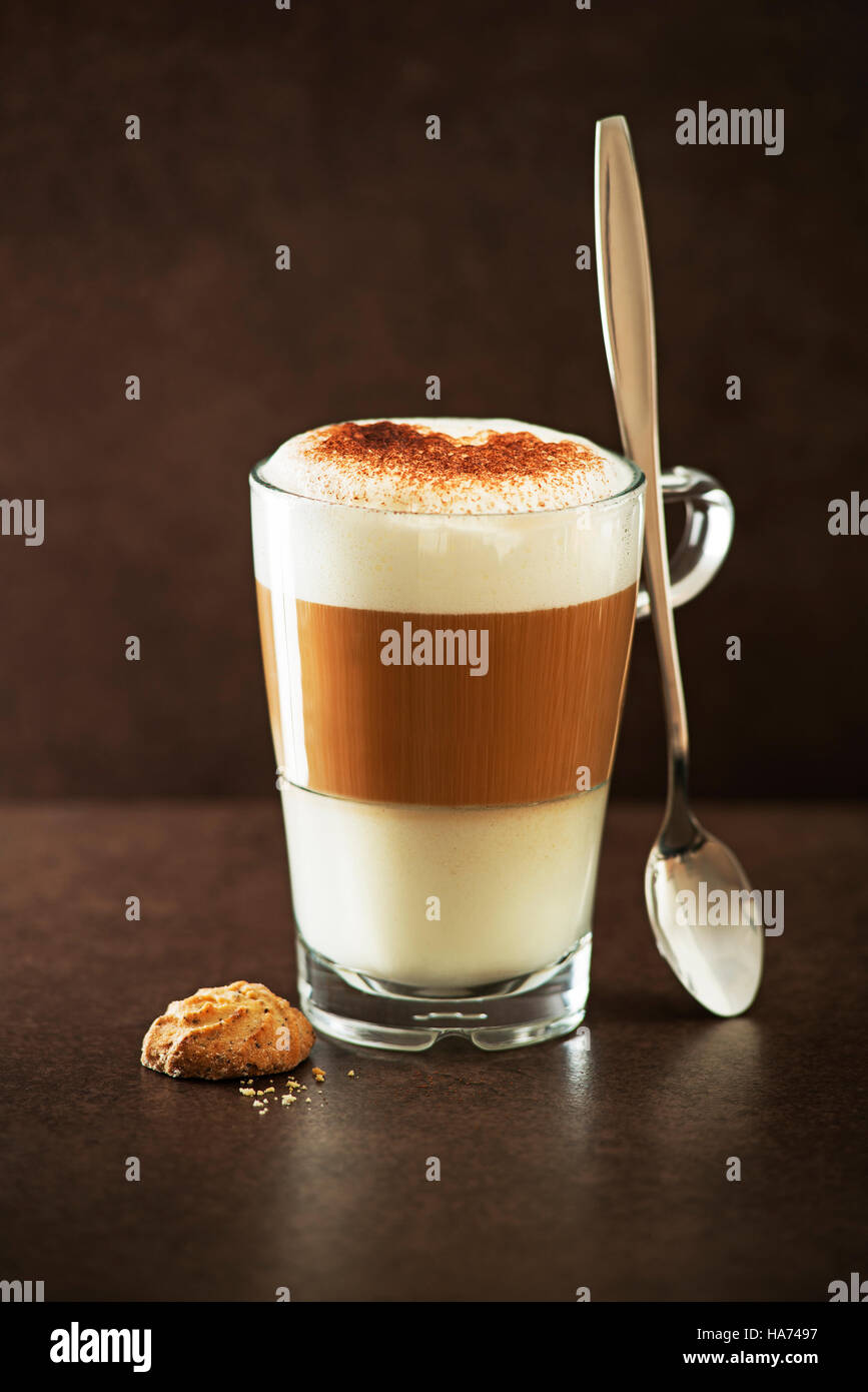 Glass of hot Latte macchiato coffee close up Stock Photo - Alamy