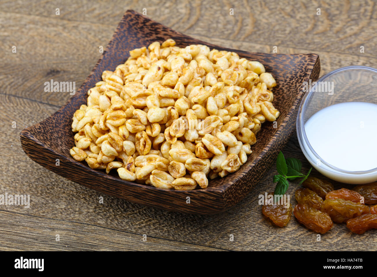 Rise flakes with milk, raisin and mint leaves Stock Photo - Alamy