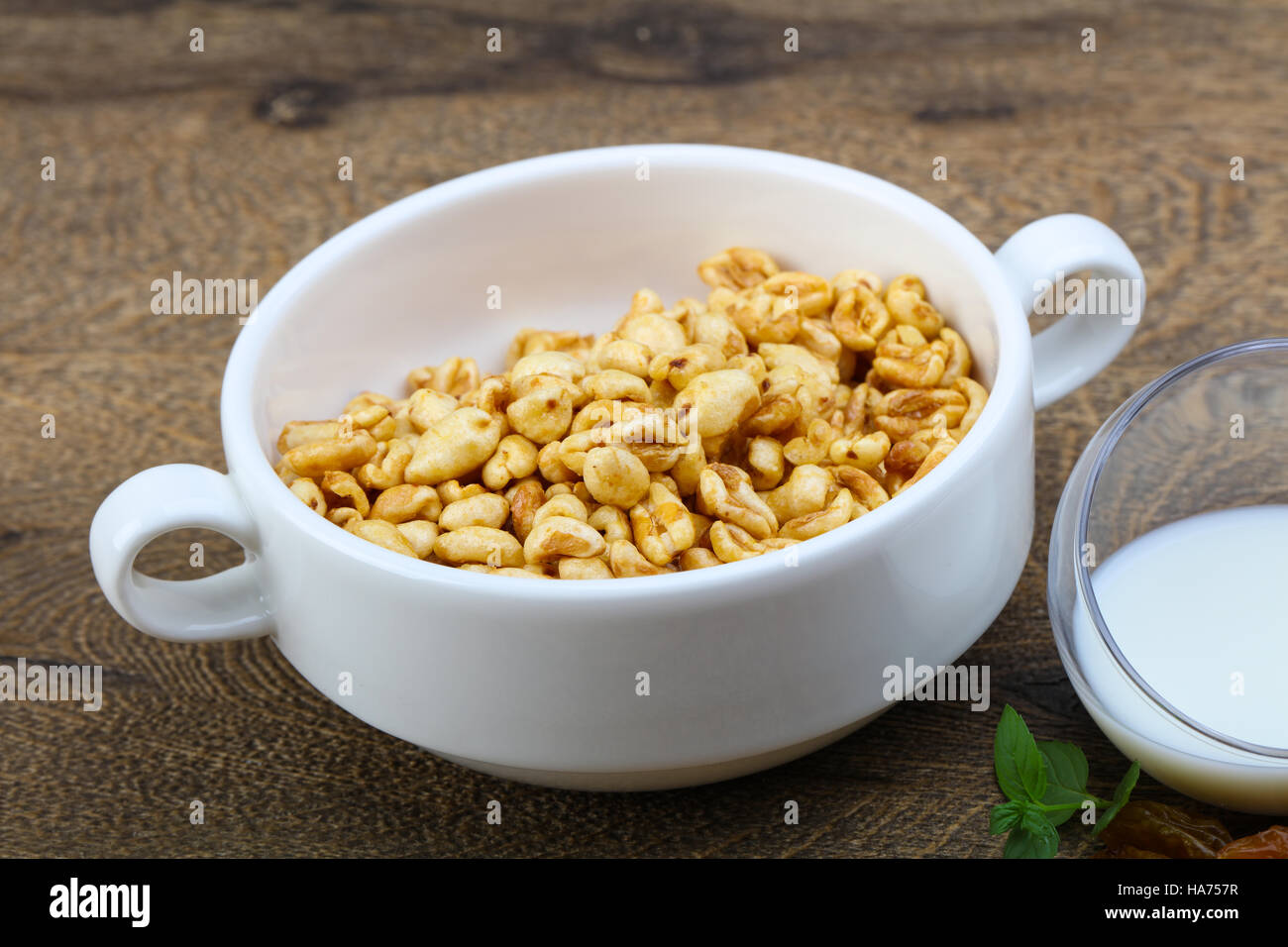 Rise flakes with milk, raisin and mint leaves Stock Photo - Alamy