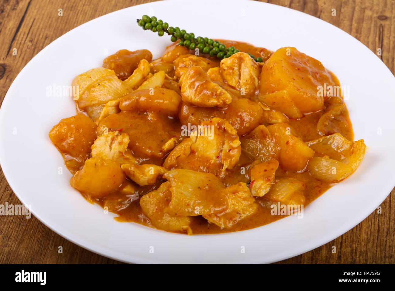 Thai traditional penang curry with chicken and spices Stock Photo - Alamy