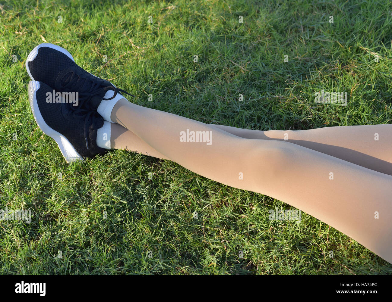 Leg cross at knee hi-res stock photography and images - Alamy