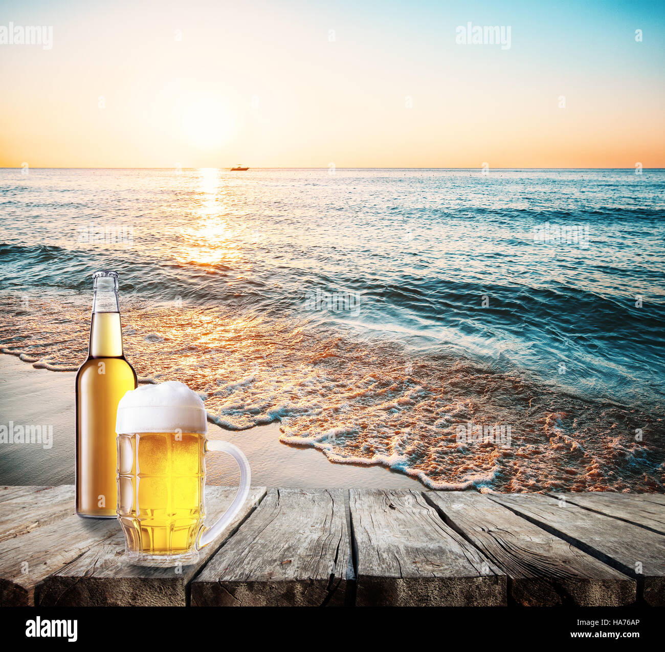 Mug and bottle of beer on a table against the sea Stock Photo - Alamy