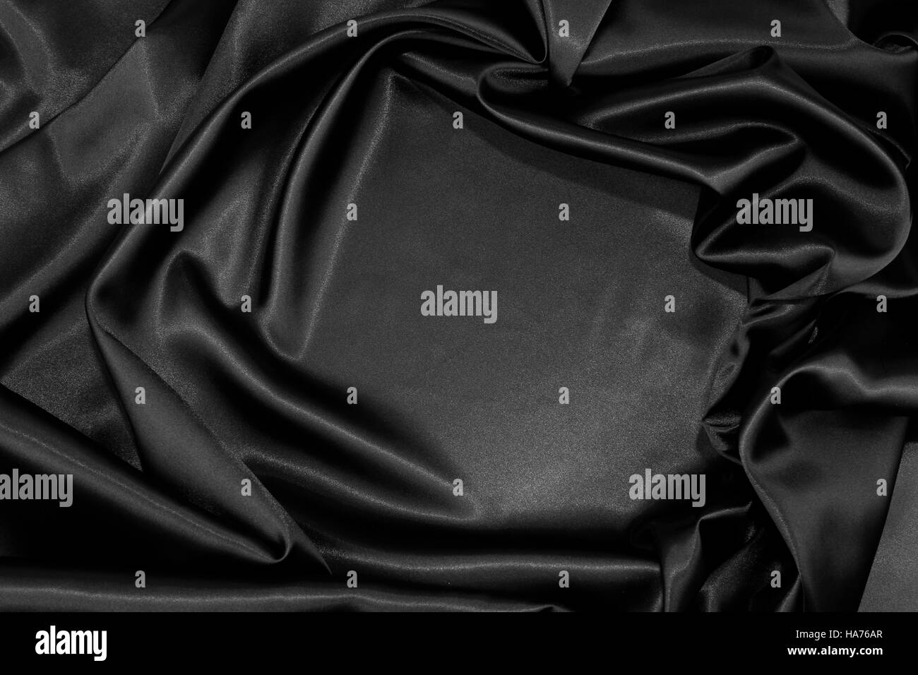 Closeup of rippled black silk fabric Stock Photo - Alamy