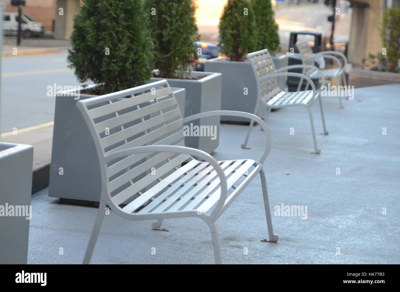 Benches on downtown walkway Stock Photo - Alamy