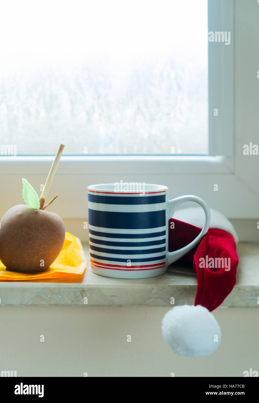 Cup of coffee on window sill Stock Photo - Alamy