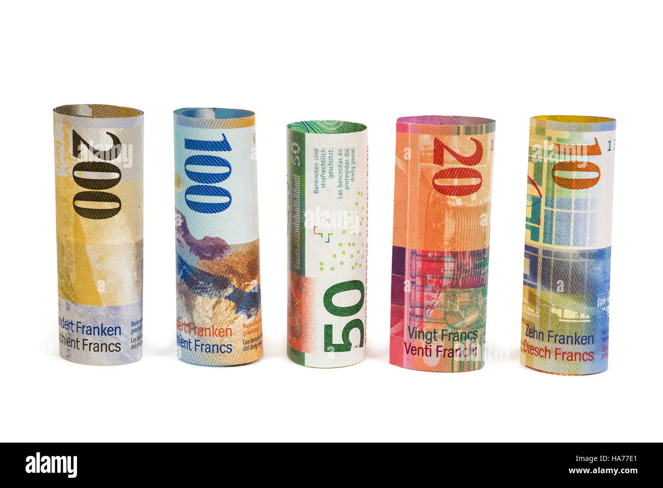 Set of rolled swiss franc banknotes isolated on white background with ...