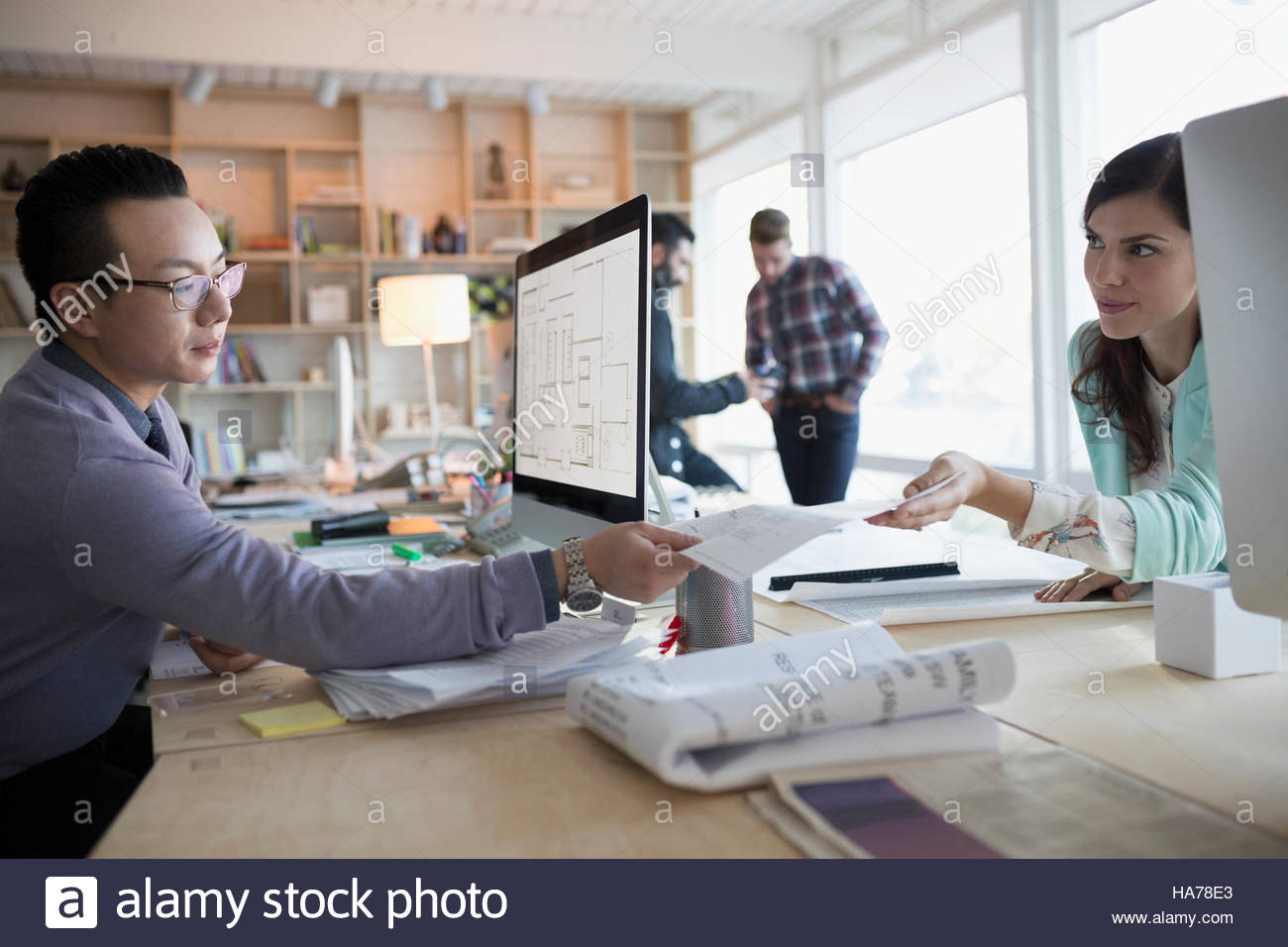 Men sitting across the desk hi-res stock photography and images - Alamy