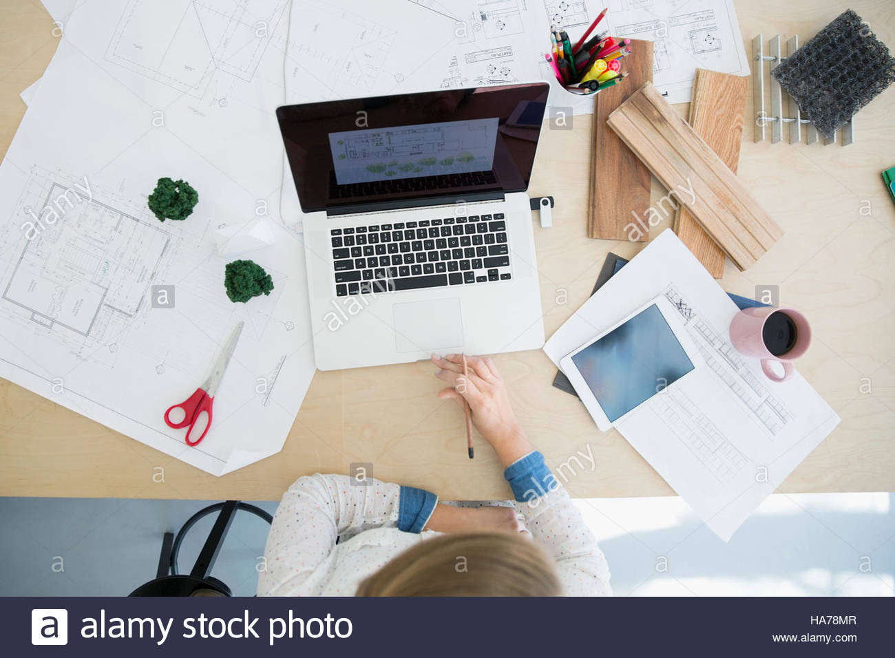 Overhead view architect drafting blueprints hi-res stock photography ...