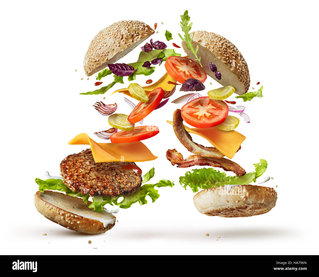 Two burgers with flying ingredients isolated on white background Stock ...