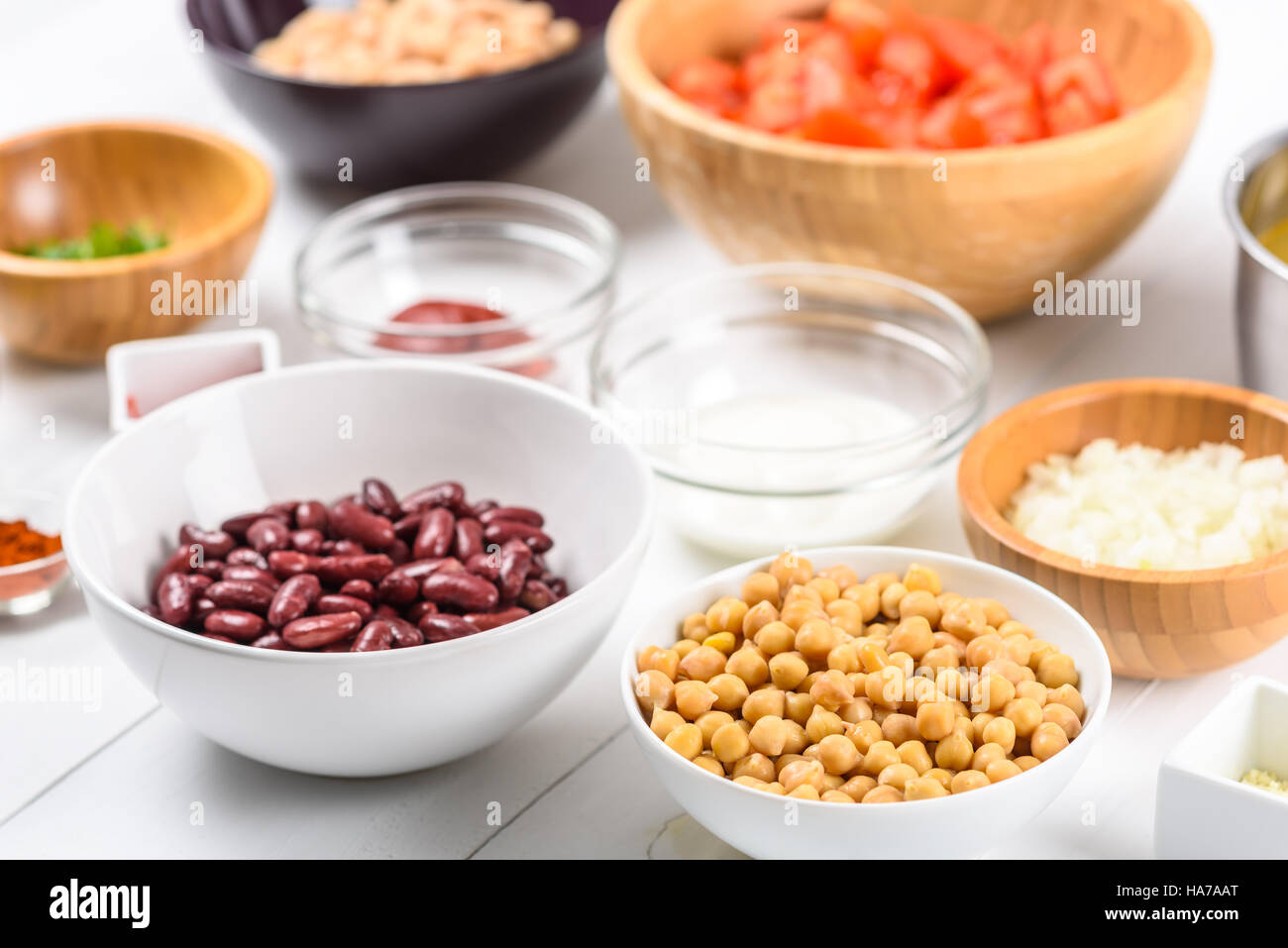 Fresh Food Ingredients On White Wood Kitchen Table Stock Photo - Alamy