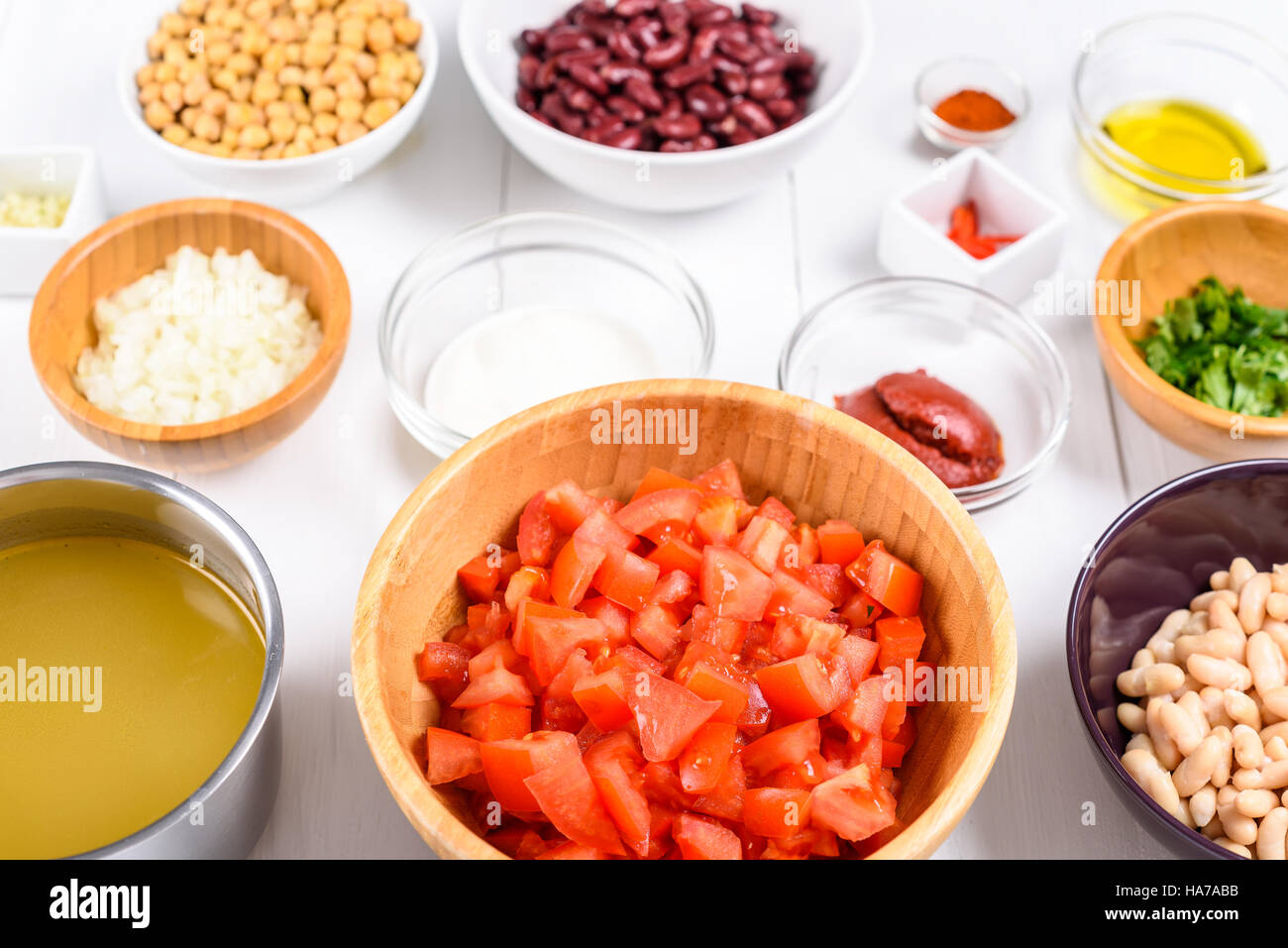 Fresh Food Ingredients On White Wood Kitchen Table Stock Photo - Alamy