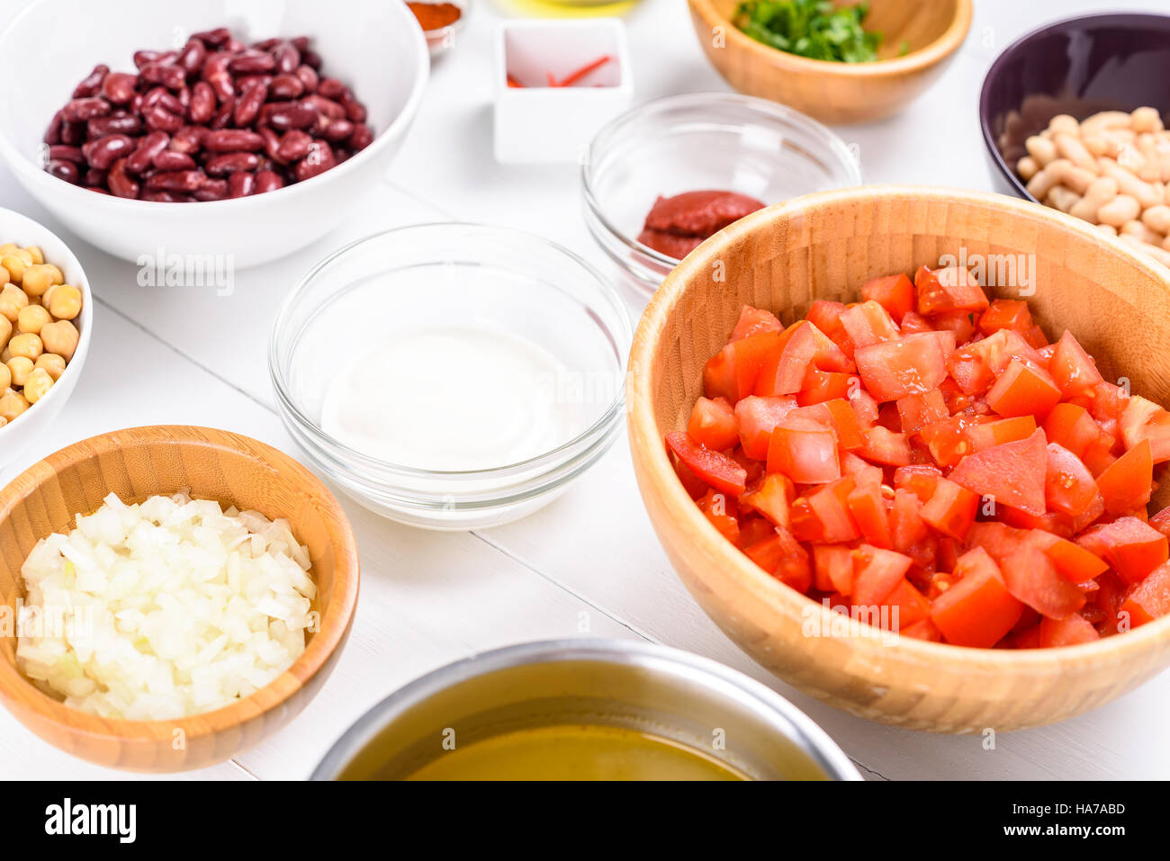 Fresh Food Ingredients On White Wood Kitchen Table Stock Photo - Alamy