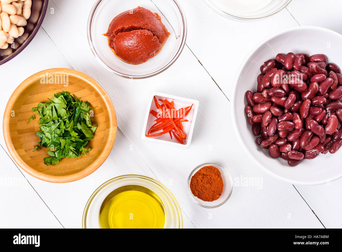 Fresh Food Ingredients On White Wood Kitchen Table Stock Photo - Alamy
