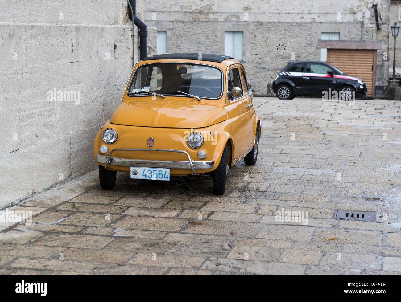 Old and new. The Fiat Cinquecento is ideal for the narrow streets of ...