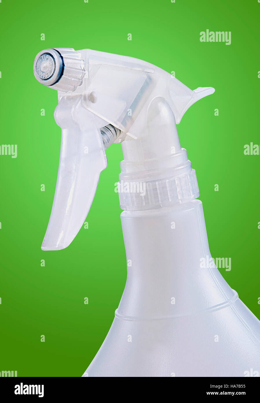 Plastic Spray Bottle with Green Solution Stock Photo - Alamy