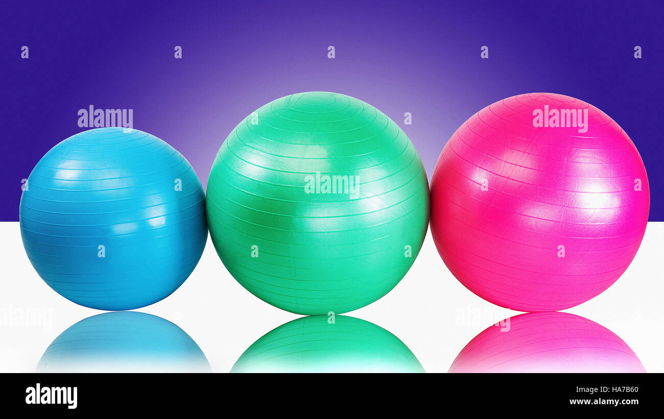 Group fitness balls for health club workout Stock Photo - Alamy