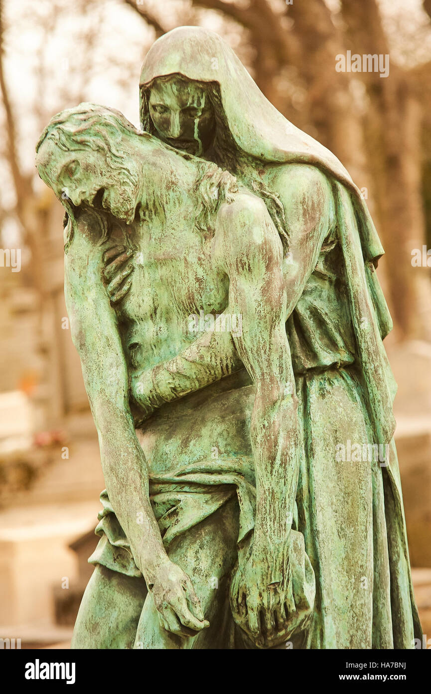 Human sculptures at cemery in Paris Stock Photo - Alamy